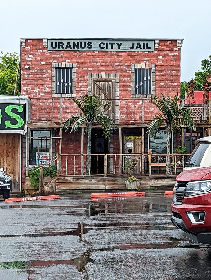 Rain-slicked boardwalks lead to the infamous brick jailhouse, a perfect backdrop for family photos and inevitable puns about "doing time in Uranus."