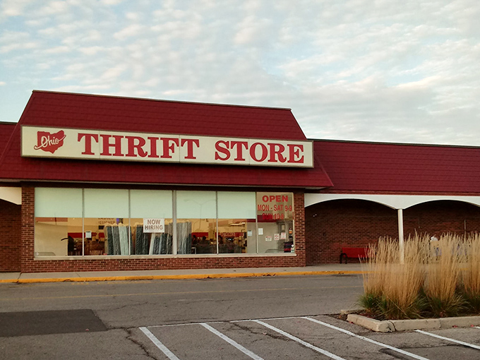 Dawn breaks over thrift paradise. Something about that early morning light hitting the storefront promises adventure awaits inside those sliding doors.
