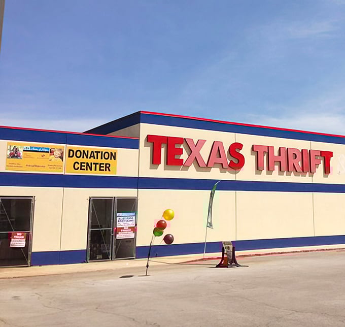 Donation Center by day, treasure trove always. The colorful balloons dancing outside hint at the carnival of finds waiting inside.