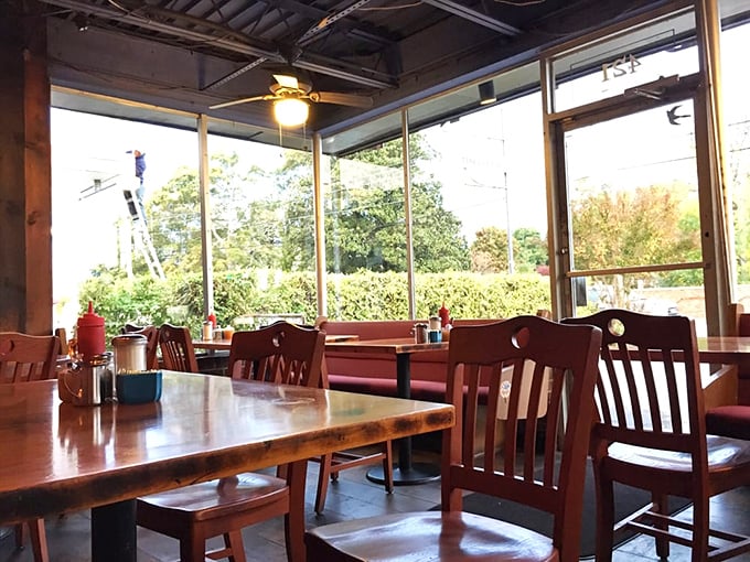 Sunlight floods through windows illuminating wooden tables with stories to tell. The kind of place where coffee refills and conversation flow equally freely. 