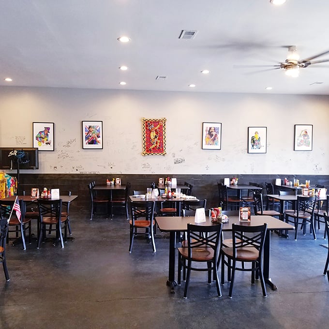 Simple tables, colorful artwork, and an atmosphere that says, "Come as you are." No pretension here&mdash;just the promise of comfort food done right.