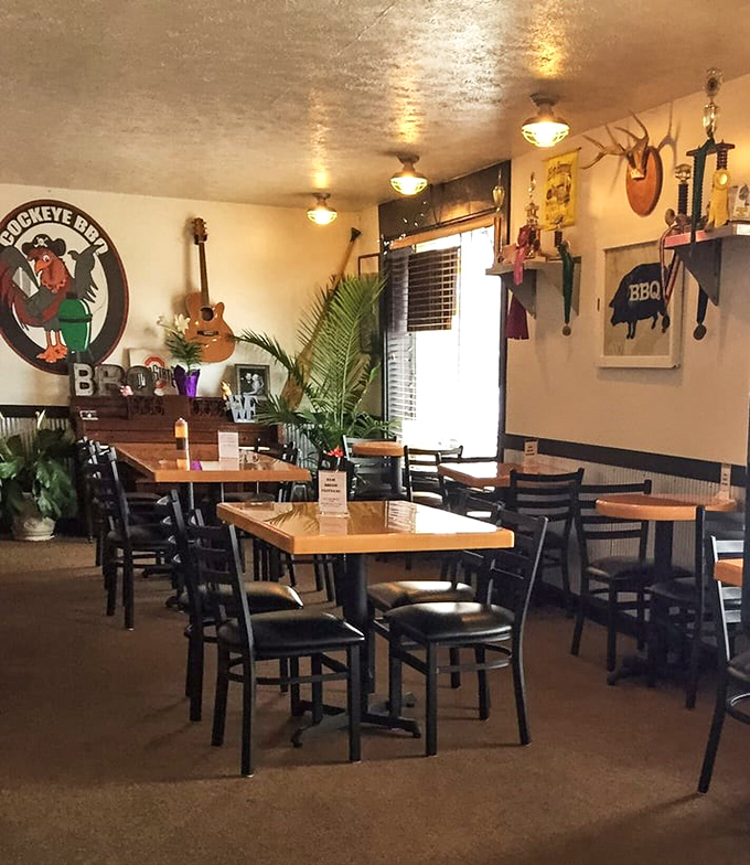 Inside, wooden tables, string lights, and barbecue memorabilia create that perfect "make yourself at home" vibe that all great BBQ sanctuaries share.