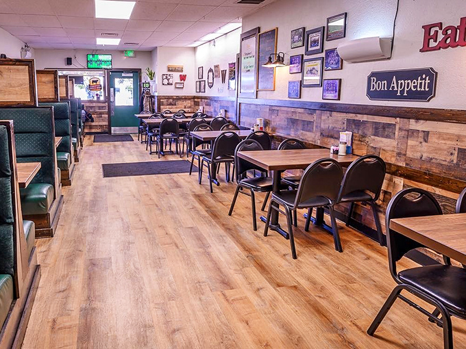 Wood paneling, comfortable booths, and that "Bon App&eacute;tit" sign that isn't being ironic. This is what dining rooms looked like before Instagram existed.