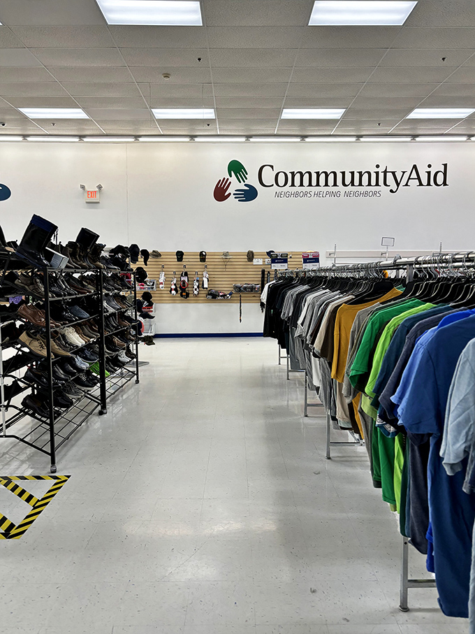 Rows upon rows of meticulously organized clothing stretch toward the horizon, a colorful testament to second chances and first-rate deals.