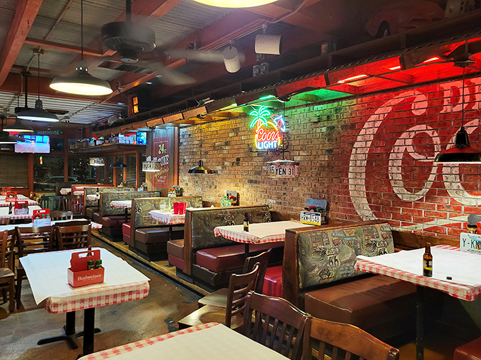 Red checkered tablecloths meet neon-lit brick walls in this temple to unpretentious dining. The kind of place where calories don't count and memories multiply.