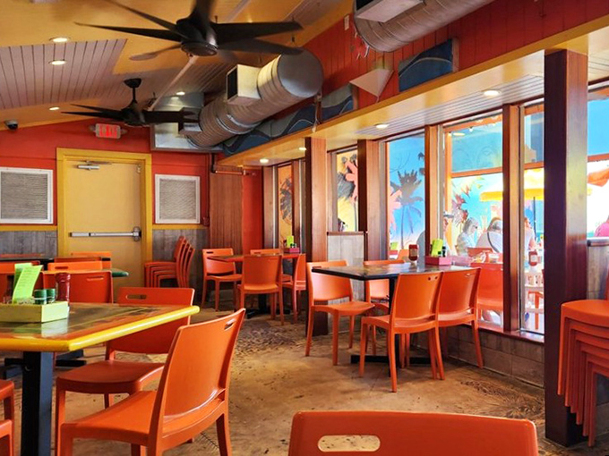 Orange you glad you came inside? The restaurant's cheerful interior with its sunset-colored chairs creates the perfect backdrop for seafood indulgence away from the midday sun.