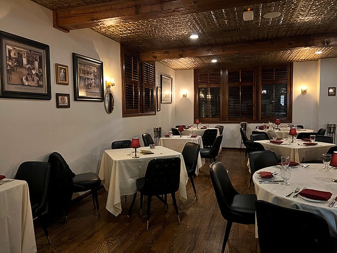 White tablecloths and ornate tin ceilings set the stage for memorable meals. This isn't trendy dining—it's timeless elegance that never goes out of style.