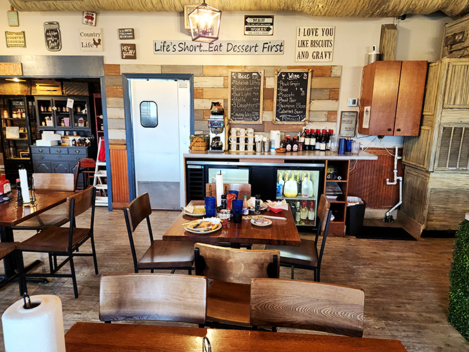 Wooden tables, rustic walls, and signs declaring "Life's Short. Eat Dessert First" tell you everything about this place's priorities. Southern hospitality built into every corner.
