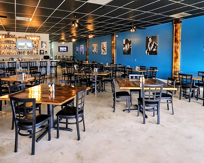 Blue walls adorned with music legends watch over diners. The wooden columns and polished tables create that perfect "special yet comfortable" vibe. 