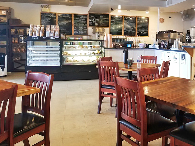 The caf&eacute;'s warm interior, with its mission-style chairs and gleaming display case, feels like the living room of a friend who happens to make incredible food.