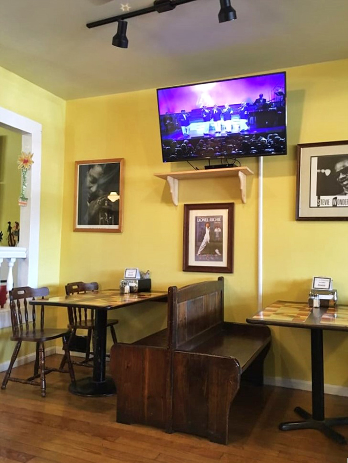 Church pew benches and music legends on the walls&mdash;this isn't just a restaurant, it's a sanctuary of soul food and sound.