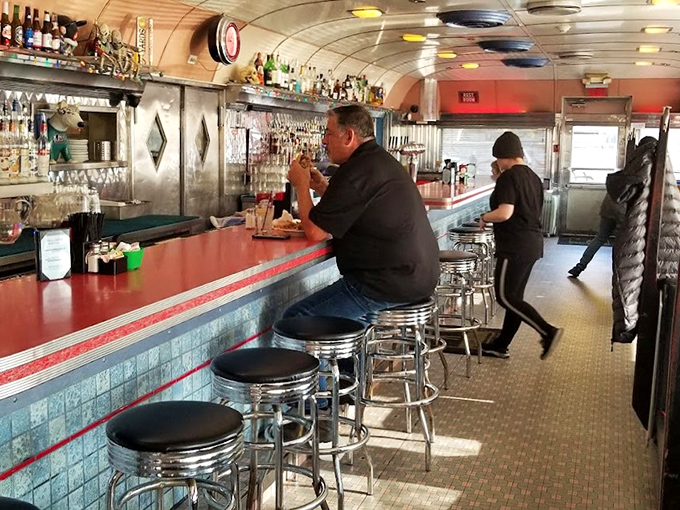 Classic diner vibes with a twist: chrome stools, turquoise tiles, and conversations that flow as smoothly as the coffee.