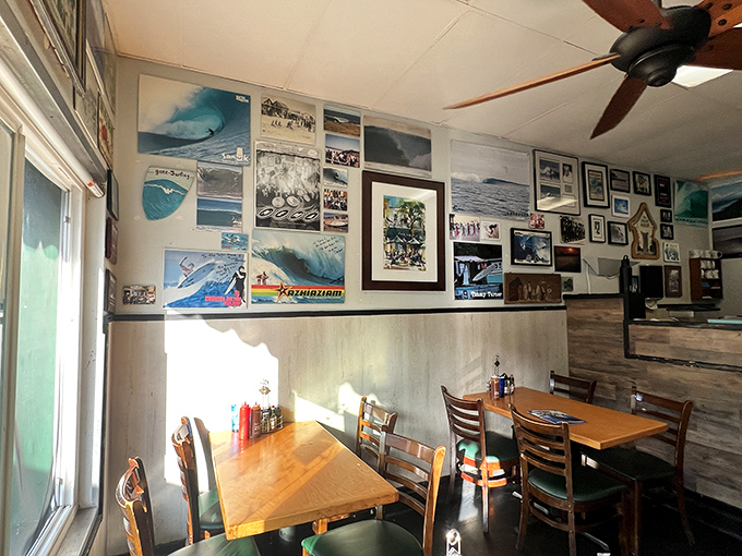 Surf history covers every inch of wall space, creating a museum where the price of admission is simply ordering something delicious. The wooden tables have witnessed countless breakfast epiphanies.
