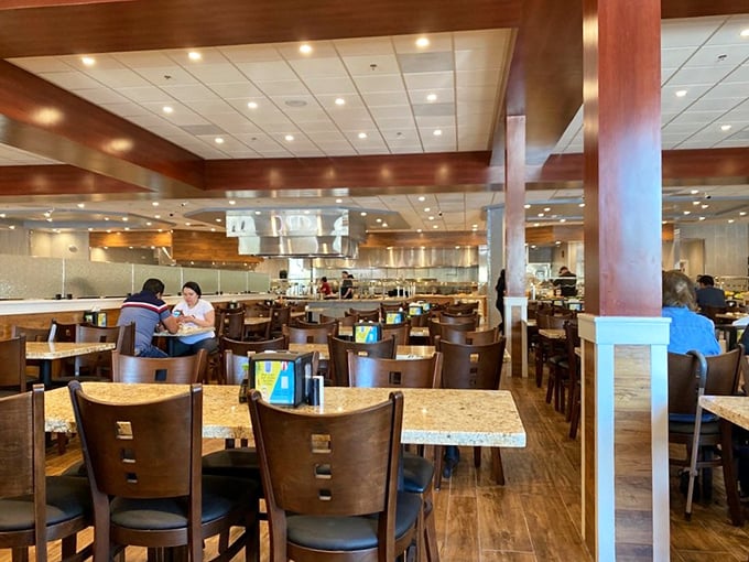 Warm wood tones and granite tabletops create an atmosphere that says "stay awhile" &ndash; this isn't your uncle's basement buffet from the '80s.