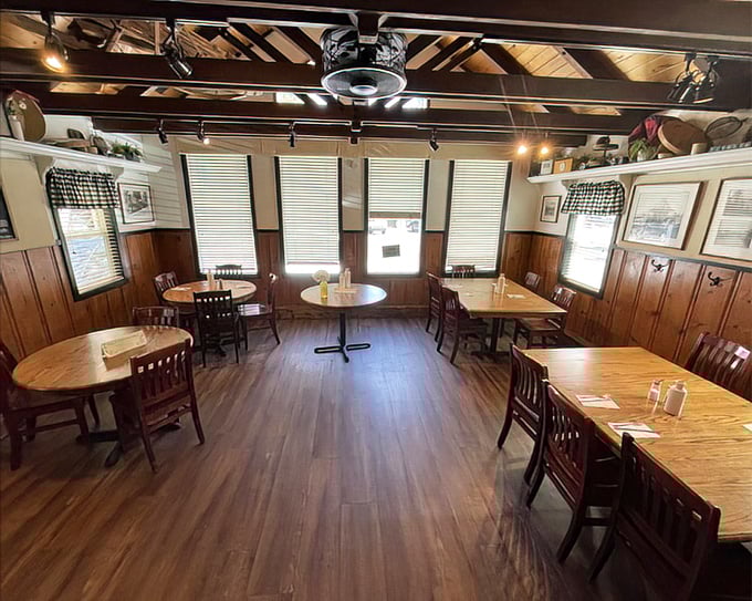 Warm wood paneling and simple tables create that perfect mountain cabin vibe – no pretension, just a cozy space where the food takes center stage.