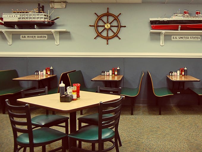 Nautical charm meets comfort at Rick's, where model ships and a captain's wheel watch over diners enjoying meals in those perfectly worn-in green booths.