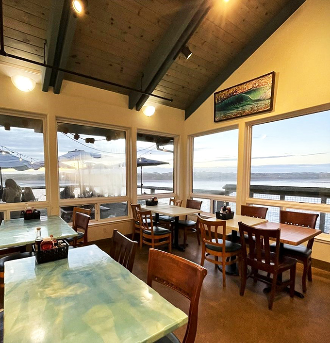 Windows that frame the harbor like living paintings create the perfect backdrop for seafood that was likely swimming in those very waters this morning.