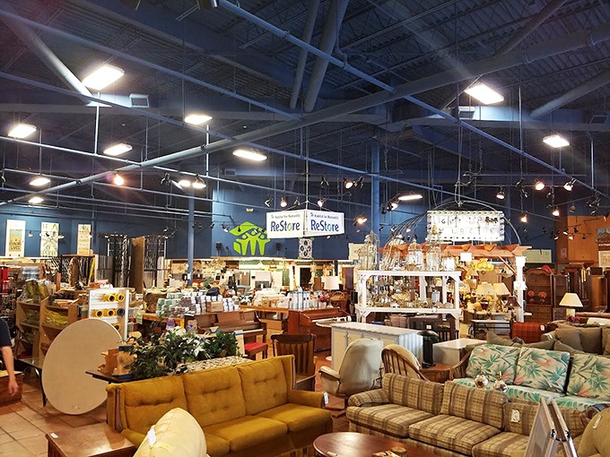 High ceilings and endless aisles create a cathedral of secondhand possibilities where one person's castoffs become another's discoveries.