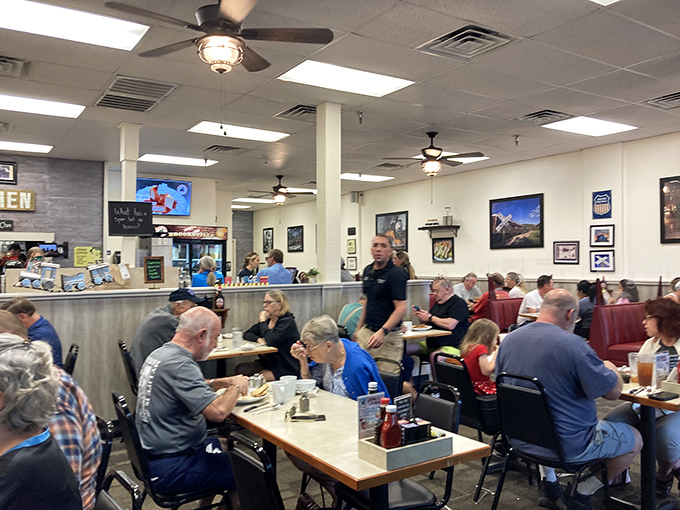 Inside, the breakfast symphony unfolds&mdash;ceiling fans whirring above conversations that matter only in small towns and diners that serve honest food.