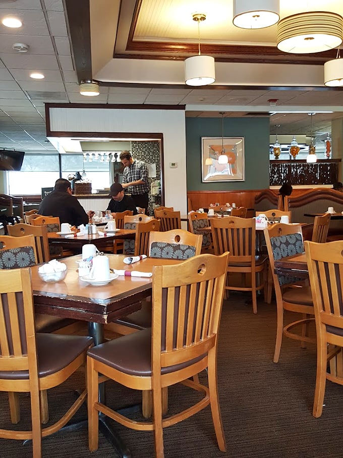 Warm wooden chairs and soft lighting create that "everybody knows your name" vibe&mdash;minus Norm and Cliff, but with better breakfast options.