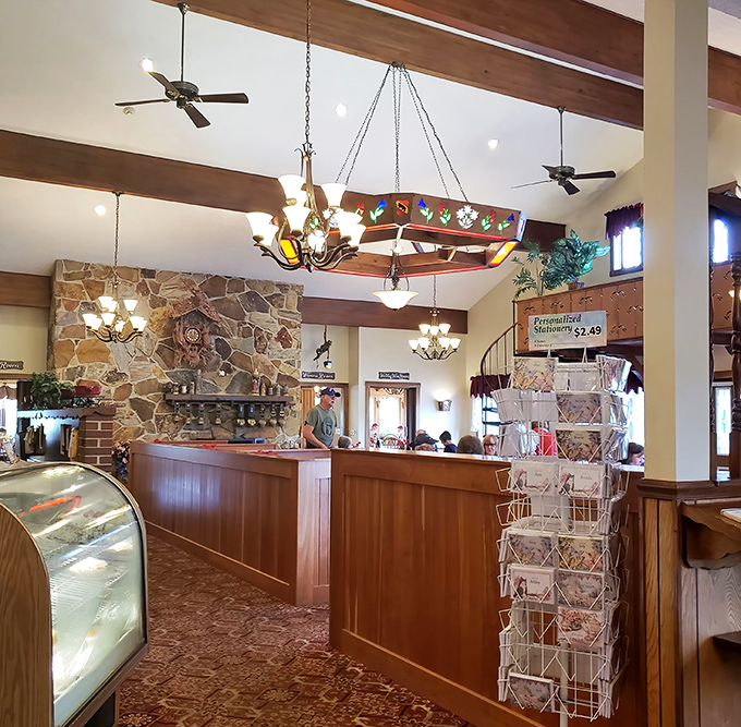 Warm wood tones, stone accents, and that distinctive lighting fixture&mdash;this isn't just retail, it's a temple to dairy craftsmanship where cheese dreams come true.