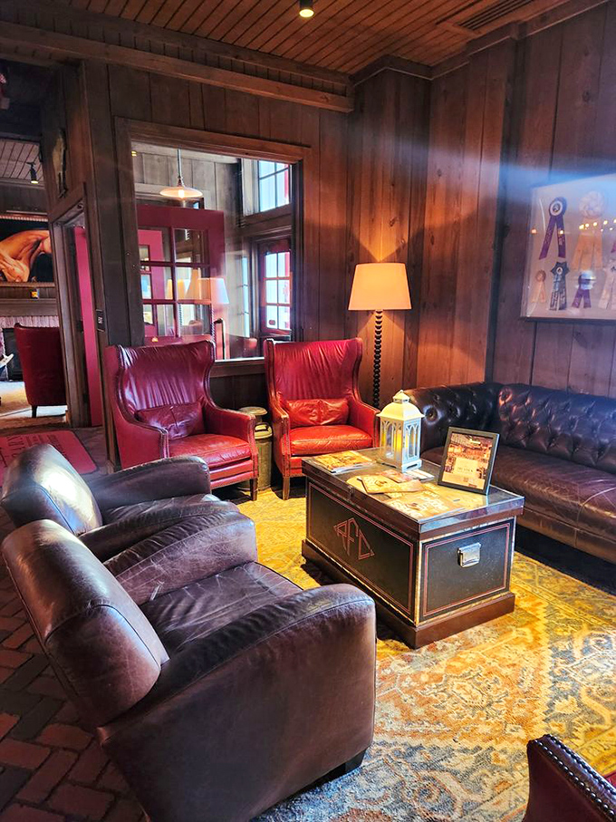 Leather chairs that practically whisper "stay awhile" surround a trunk coffee table in this lounge area where pre-dinner drinks become an event themselves.