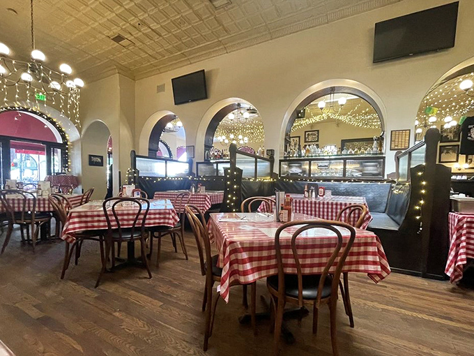 Step inside and you're transported to a bygone era&mdash;red checkered tablecloths, pressed tin ceilings, and string lights creating the perfect atmosphere for breakfast bliss.