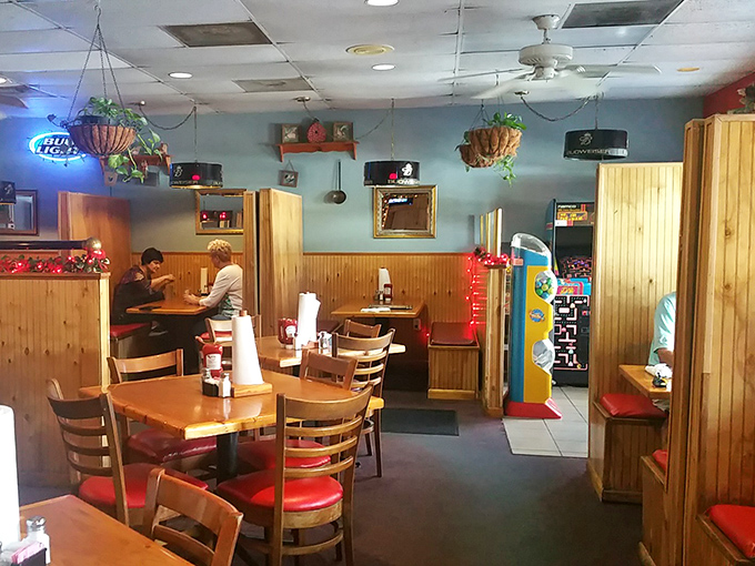 Inside, wood paneling and blue walls create that perfect "come as you are" atmosphere where comfort trumps pretension and flavor reigns supreme.