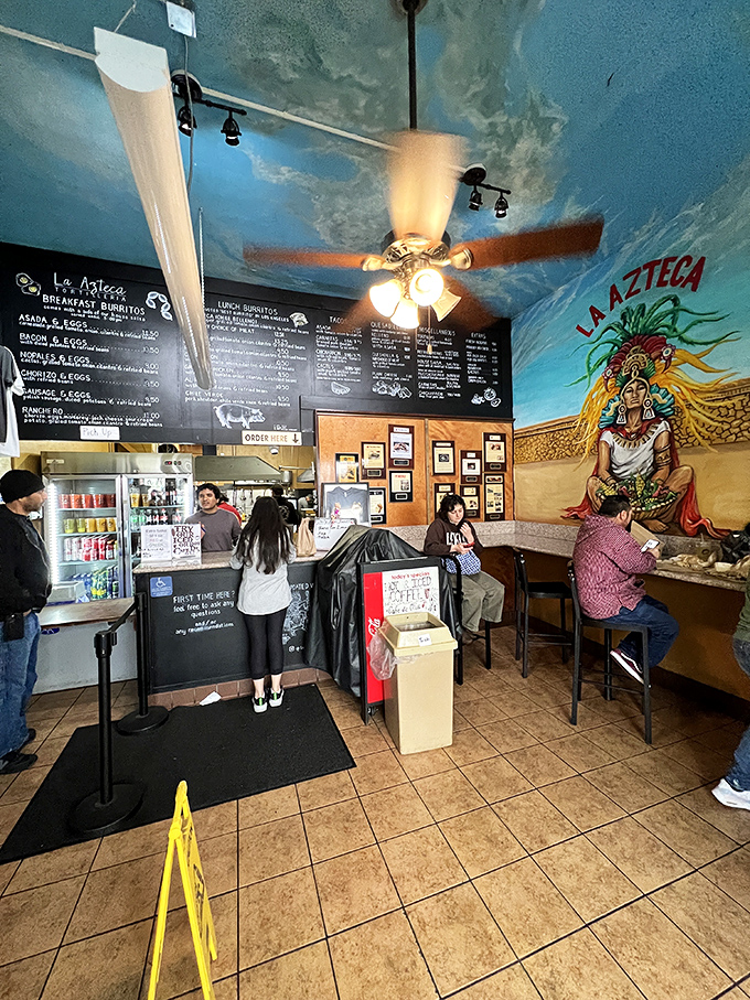 Inside, the cloud-painted ceiling and Aztec mural create an atmosphere that's both humble and magical&mdash;like a tortilla temple.
