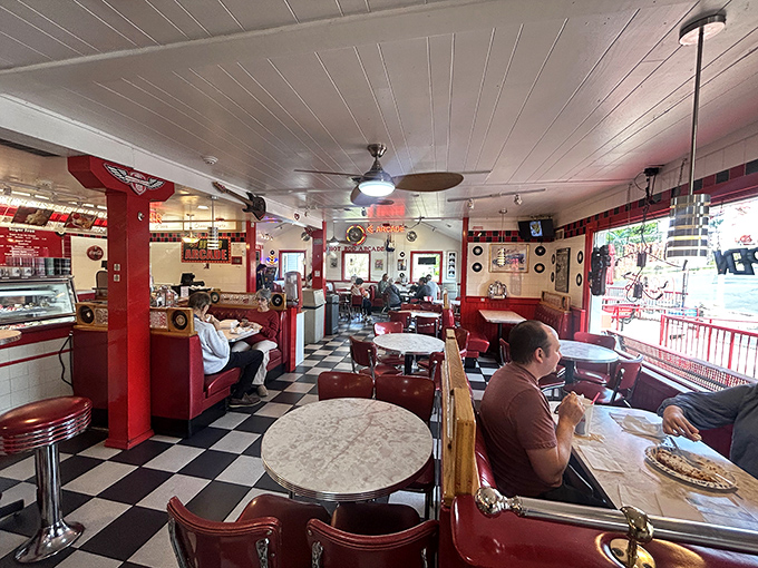 Classic checkerboard floors and cherry-red booths create the perfect backdrop for both first dates and "remember when" conversations with old friends.