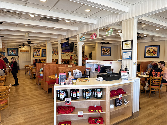 Inside Skillets, wooden booths and cheerful decor create that perfect "everybody knows your name" vibe where breakfast dreams come true.