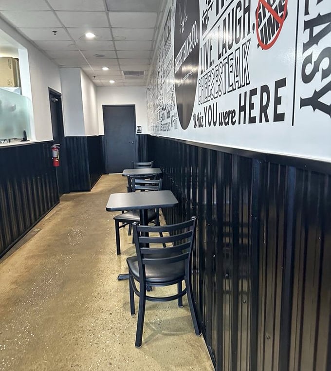 Black wainscoting and motivational food quotes set the stage for sandwich greatness. No frills needed when the cheesesteaks do all the talking.