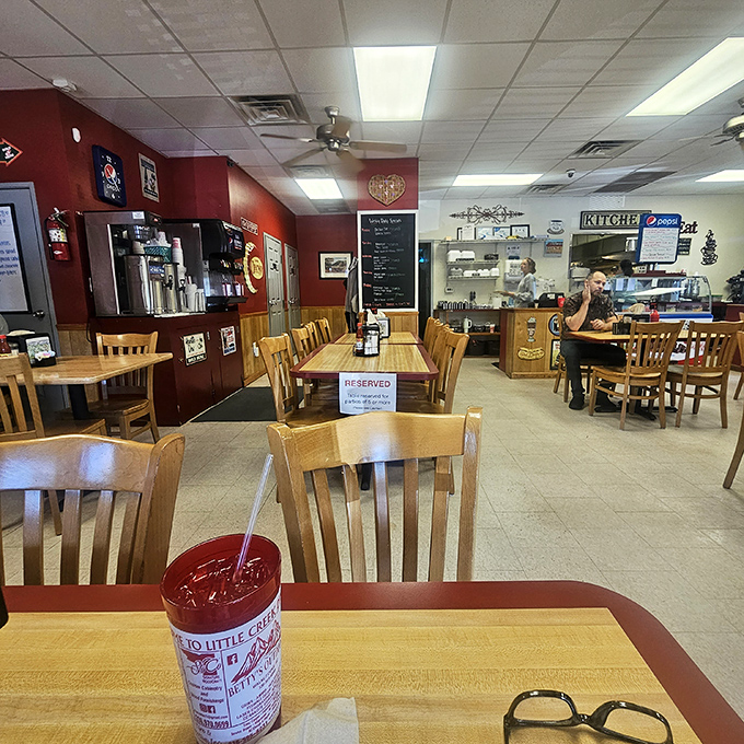 Red walls, wooden chairs, and ceiling tiles that have witnessed thousands of "mmms" and "aahs" &ndash; the stage is set for food that steals the show.