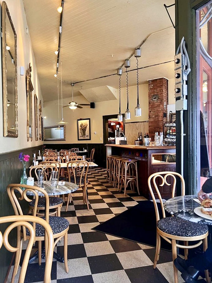 Step inside to a world of bentwood chairs, checkered floors, and pendant lighting that whispers, "Slow down, you're in France now."