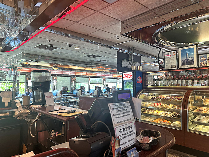 Where nostalgia meets appetite &ndash; the classic diner counter promises conversations with strangers who might become friends over coffee refills.
