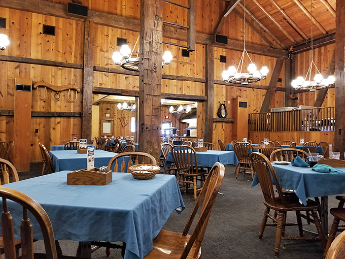 Rustic wooden beams and blue tablecloths create the perfect backdrop for comfort food memories. This isn't Instagram-engineered nostalgia &ndash; it's the real deal.