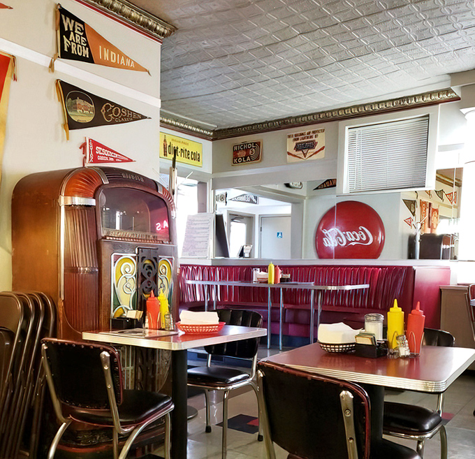 Warm wood tones, comfortable leather booths, and stone accents create an atmosphere that's sophisticated yet welcoming&mdash;like a backyard barbecue that went to finishing school.