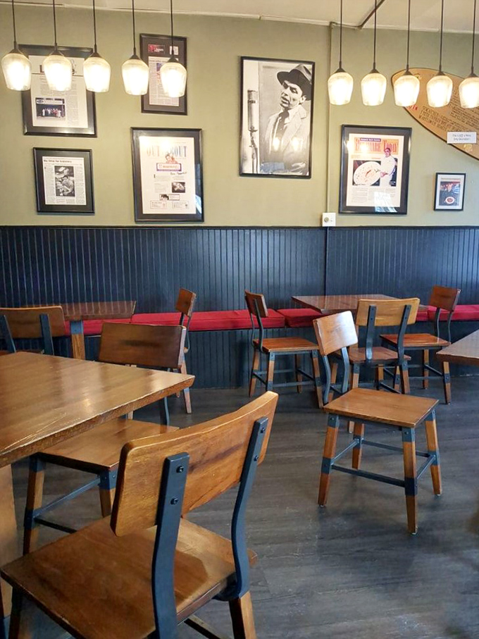 Inside, Sinatra watches over diners from the wall while pendant lights cast a warm glow that makes everyone look like they're in a classic film.