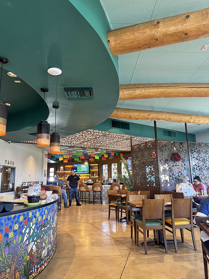 Step inside where mosaic artistry meets comfort food, creating an atmosphere that's pure visual feast before you eat.