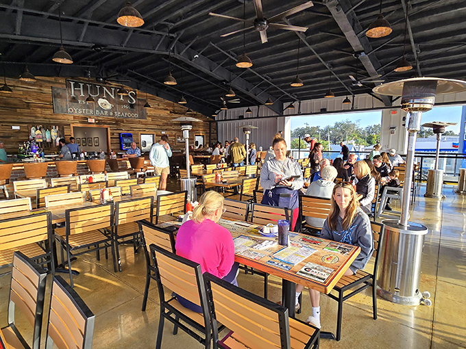 Inside Hunt's, rustic wooden charm meets seafood sanctuary. The kind of place where calories don't count and seafood stories get better with each telling.