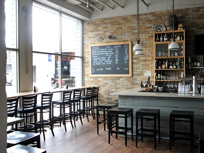 Industrial-chic meets coastal comfort in this airy bar area where oyster dreams and cocktail schemes come to life.