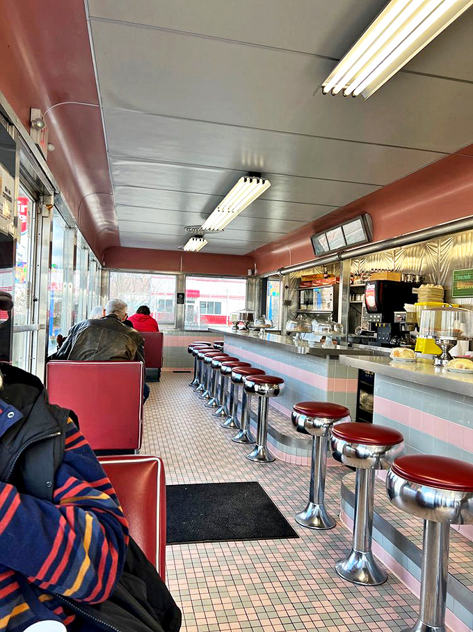 Classic counter seating where coffee refills appear like magic and strangers become friends over shared stories and tenderloin recommendations.