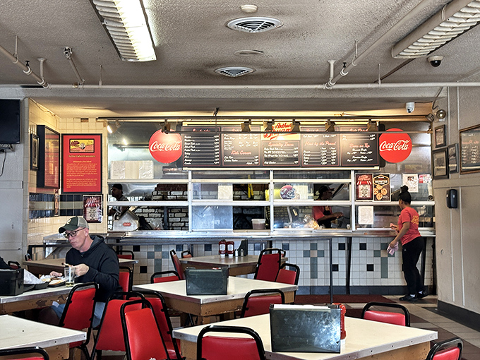 No-frills fluorescent lighting, simple tables, and a counter where culinary dreams come true. This isn't dining&mdash;it's a barbecue pilgrimage. 