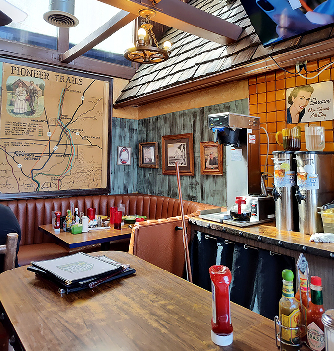 Step inside and time travel to a bygone era where pioneer maps and wood-paneled walls tell stories of travelers who came before you.