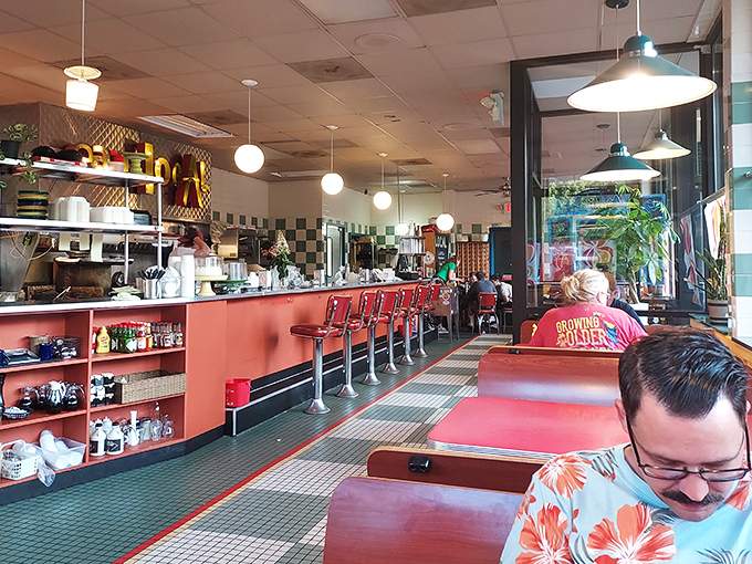 Classic diner vibes meet modern comfort in this inviting space where every seat offers breakfast bliss.