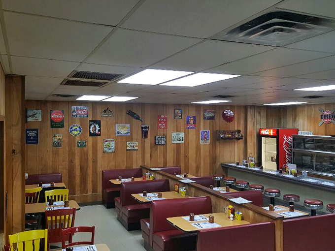 Classic wood paneling and vintage signs aren't trendy design choices here&mdash;they're time capsules from when conversations happened face-to-face instead of screen-to-screen.