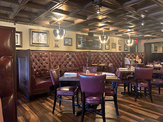 These leather booths have cradled more happy diners than a grandmother's arms at Thanksgiving. Classic steakhouse elegance never goes out of style.