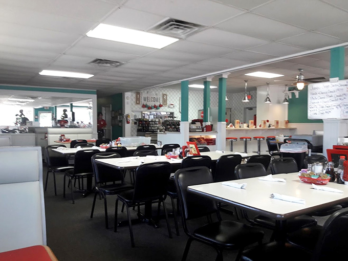 Inside, turquoise accents brighten classic diner simplicity. This isn't where you come for ambiance—it's where you come for food that makes ambiance irrelevant.