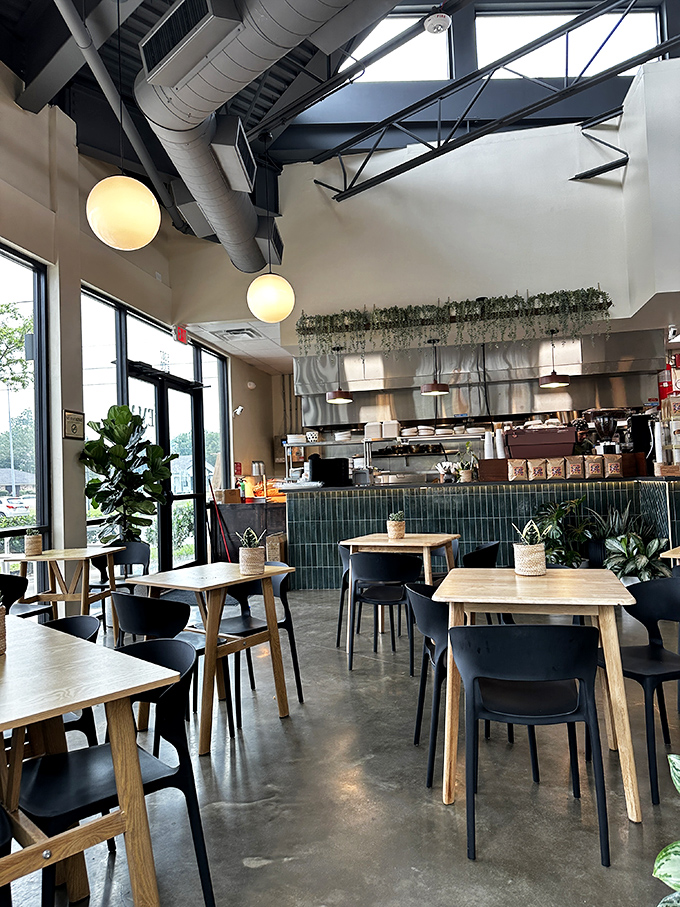 High ceilings, hanging plants, and honest design create a space that feels both airy and intimate. Like a stylish friend's dining room &ndash; if your friend were a culinary genius.