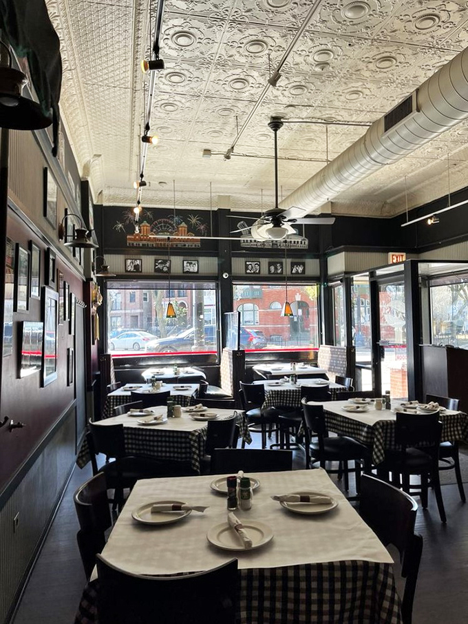 Vintage tin ceilings, classic checkered tablecloths, and warm lighting create that "I've just come home" feeling every neighborhood restaurant aspires to achieve.